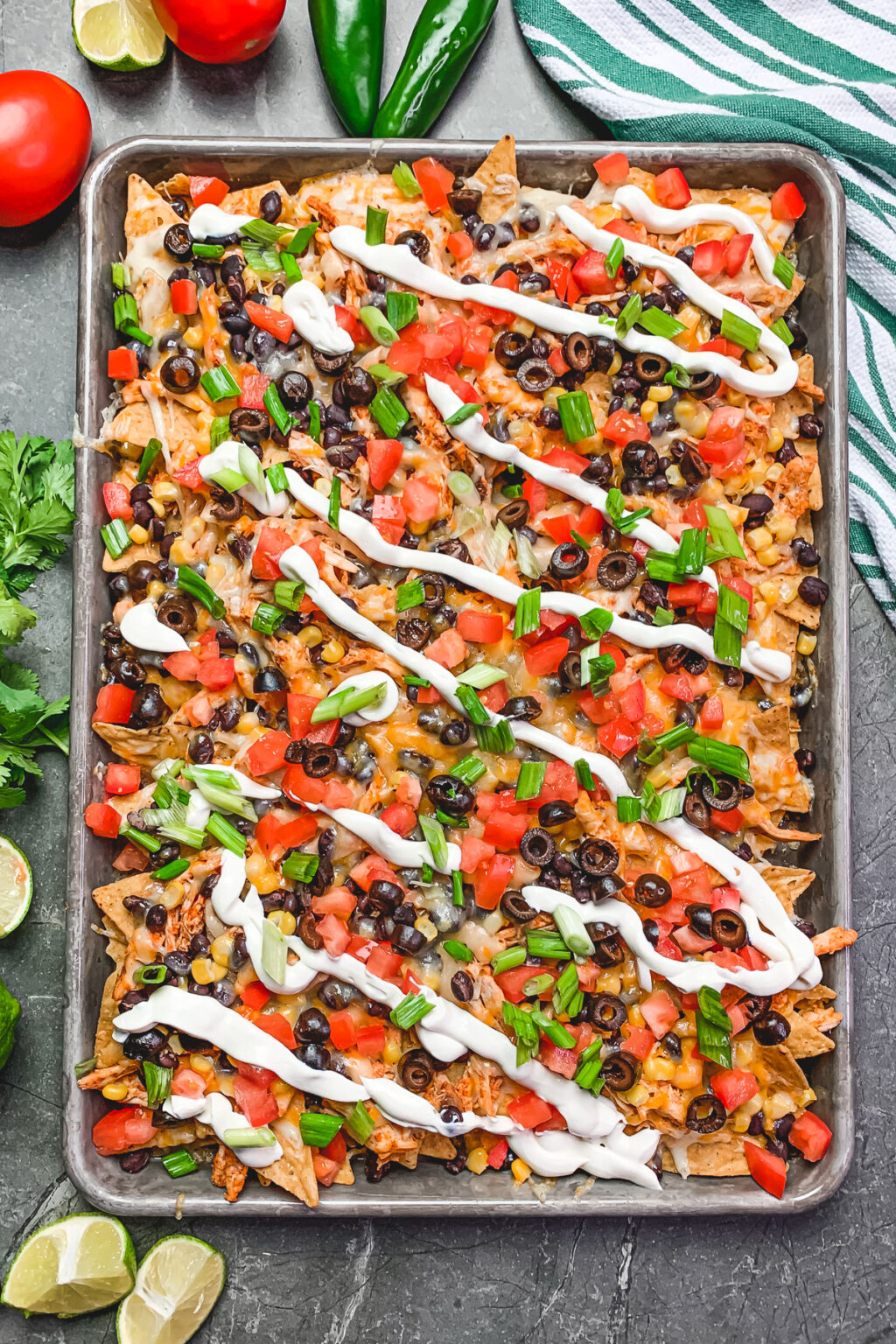 Sheet Pan Chicken Nachos Recipe | Modernmealmakeover.com