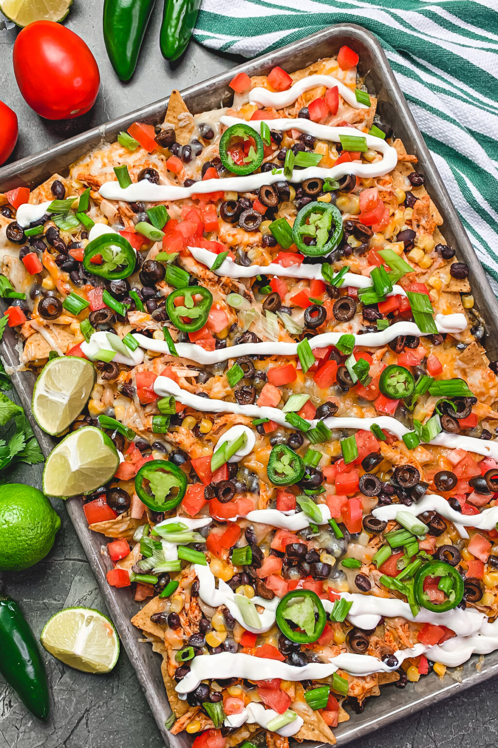 Sheet Pan Chicken Nachos Recipe | Modernmealmakeover.com