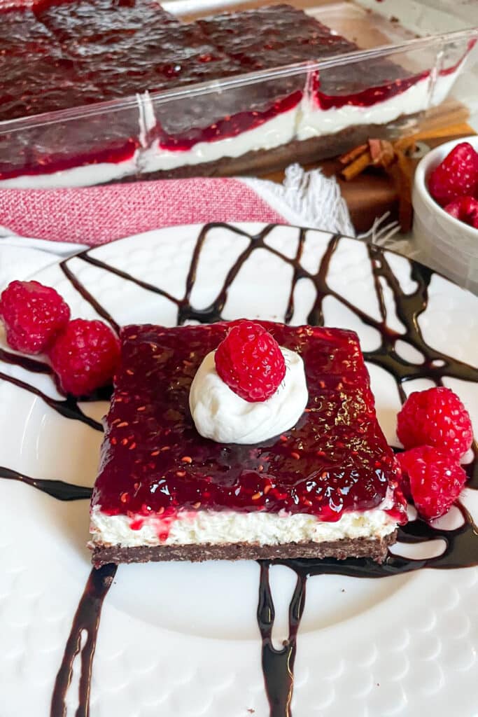 Best Chocolate Raspberry Cheesecake Bars Recipe | Modernmealmakeover.com